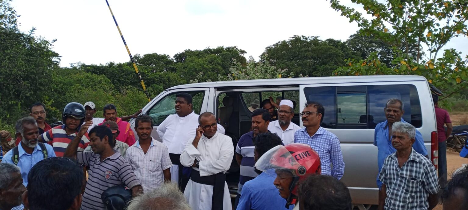 Sinhala Buddhist monk blocks Tamils from accessing land subject to ...